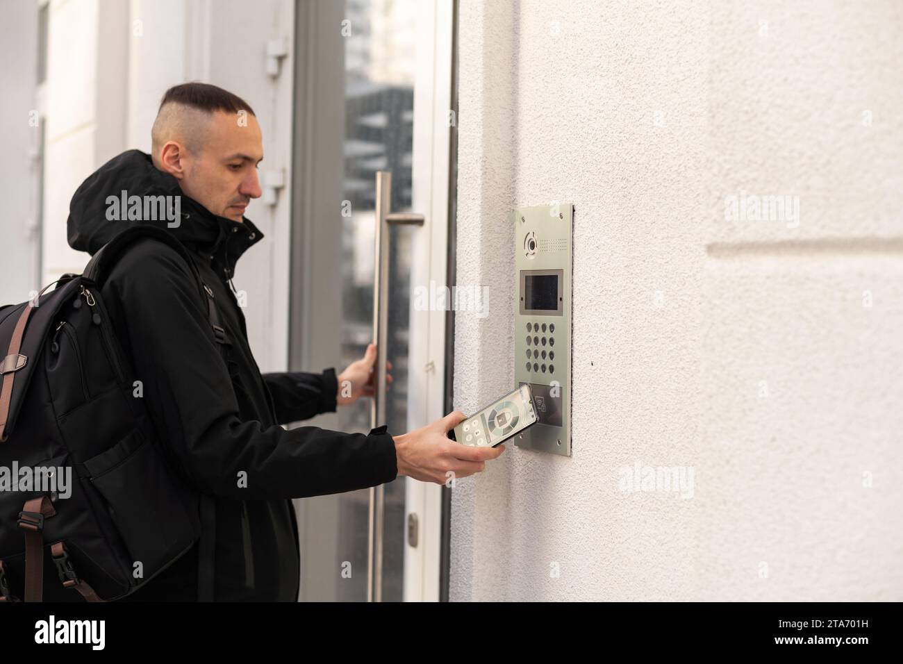 Man and hands locking door hi-res stock photography and images - Alamy