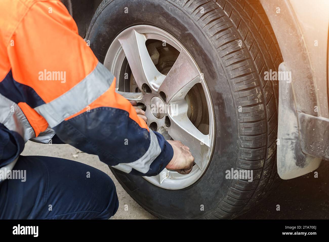Sheet metal corrosion over wheel of old white car. Rusty messy surface ...
