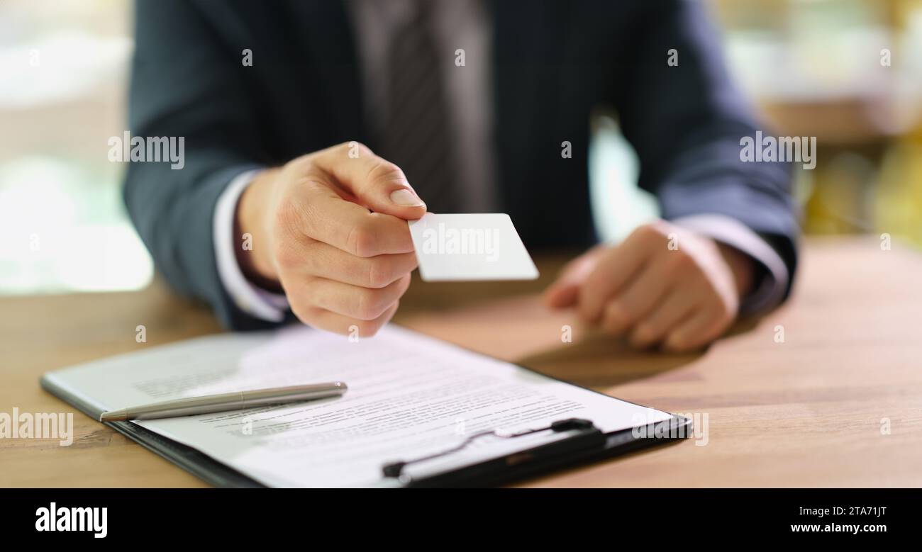 Handing out business client hi-res stock photography and images - Alamy