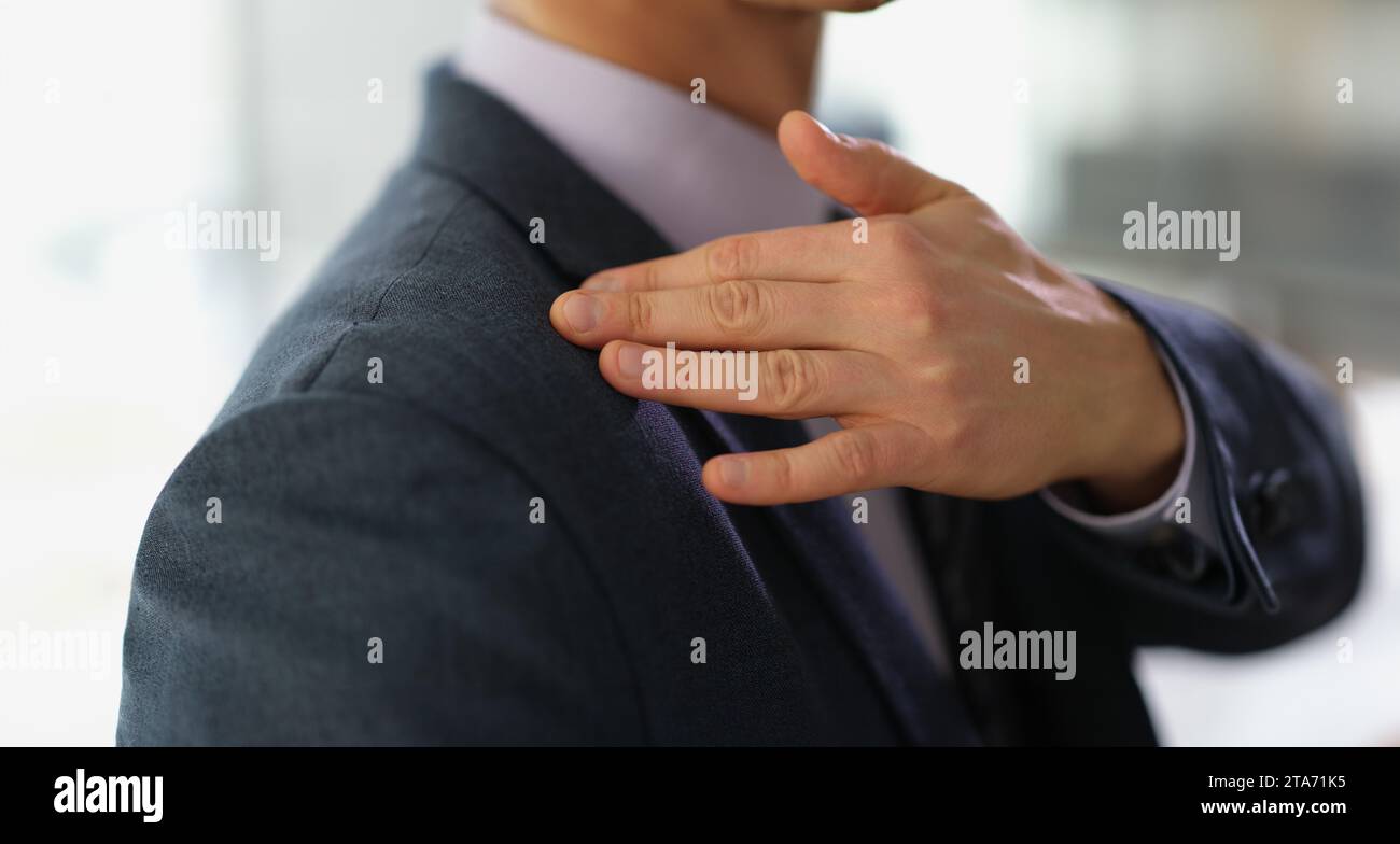 Brush off shoulder hi-res stock photography and images - Alamy
