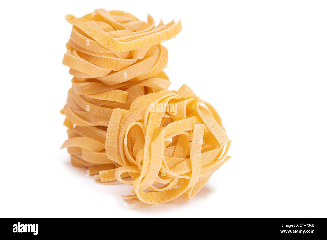 Four Classic Italian Raw Egg Fettuccine - Isolated on White Background ...