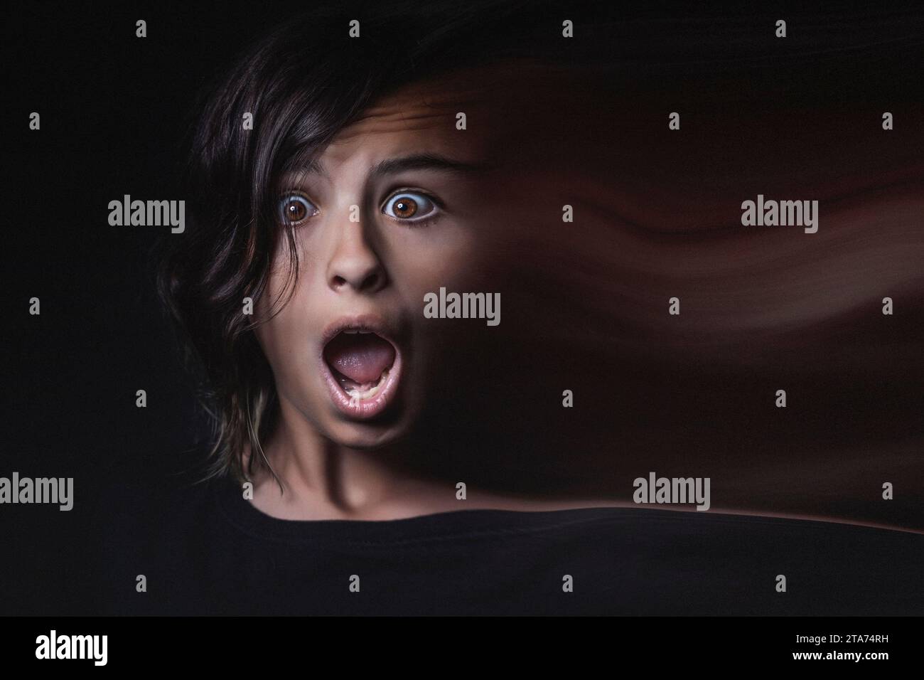 Portrait of a scared teenage girl losing her identity with her face ...