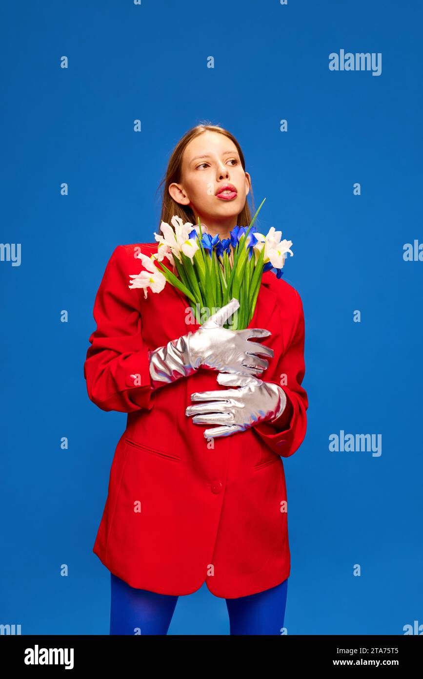 modern fashion. Beauty inside. Weird girl with flowers in unusual ...