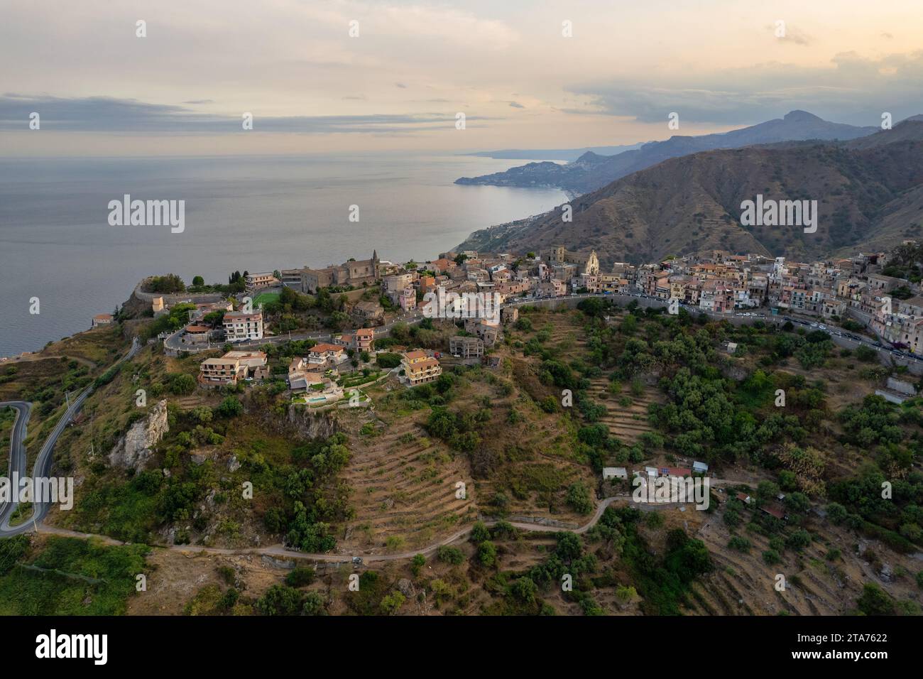 Aerial view of old medieval town of Forza d'Agro and coastline, Messina ...