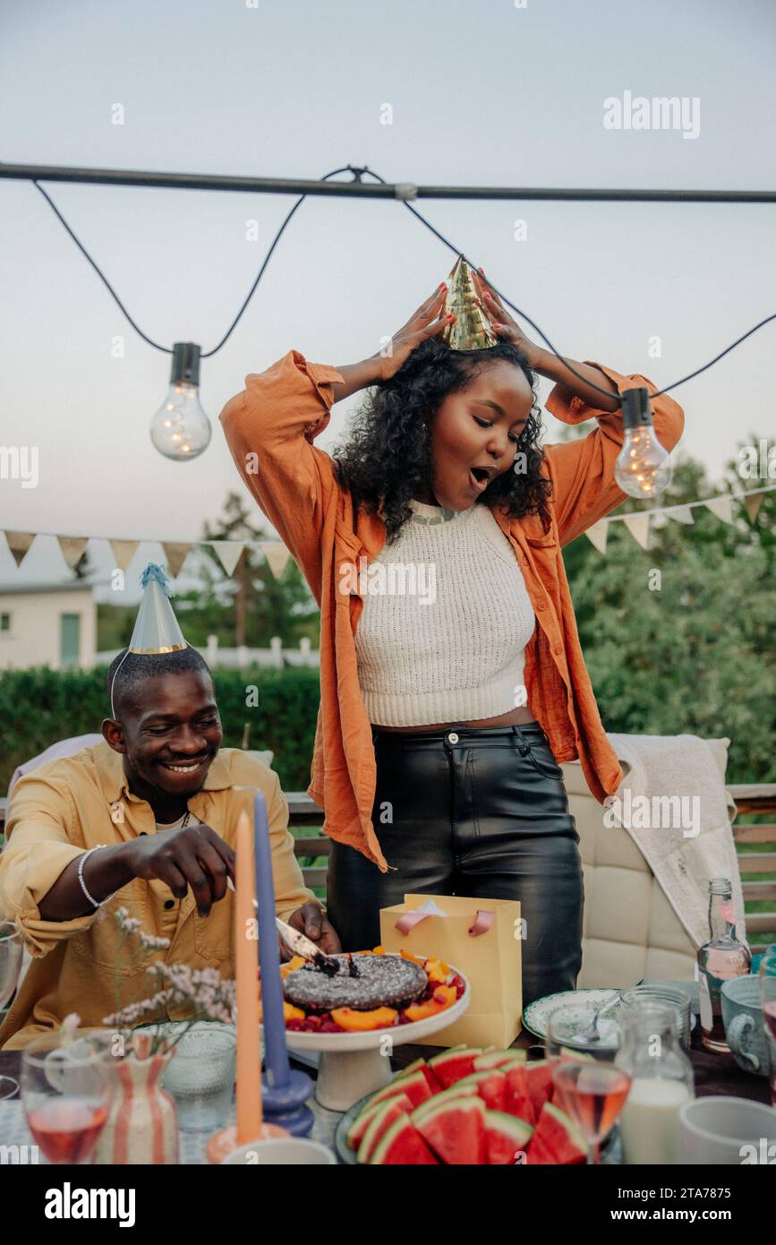 Young woman in party hat hi-res stock photography and images - Alamy