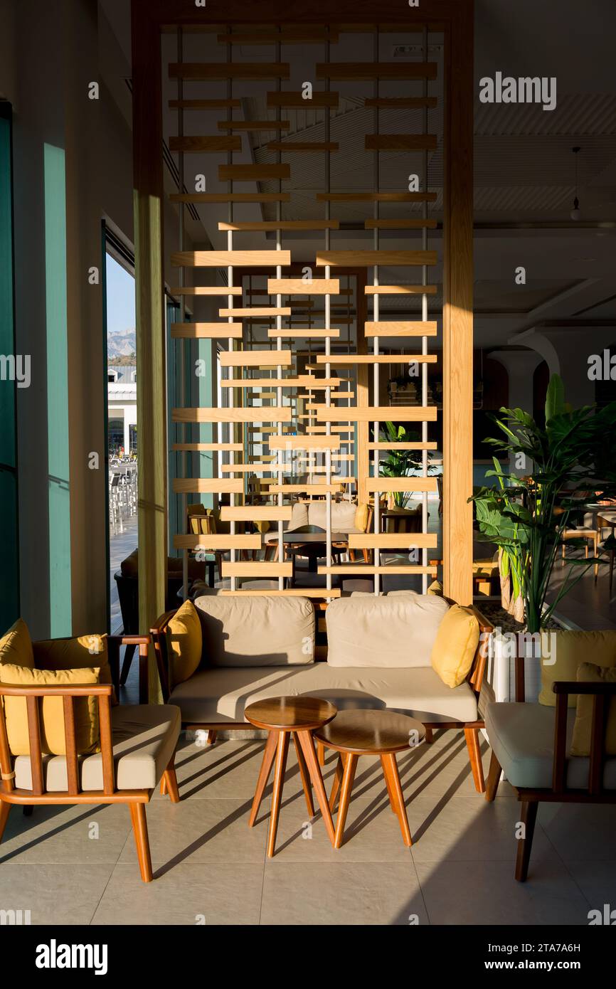 Furniture relaxing under bright sunlight, modern street cafe design ...