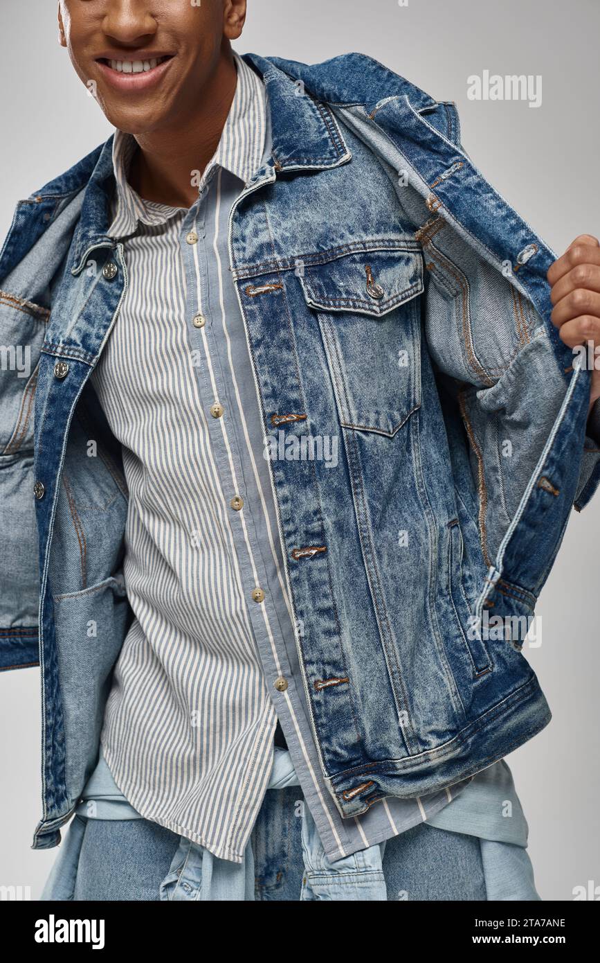 cropped view of stylish african american male model posing in trendy ...