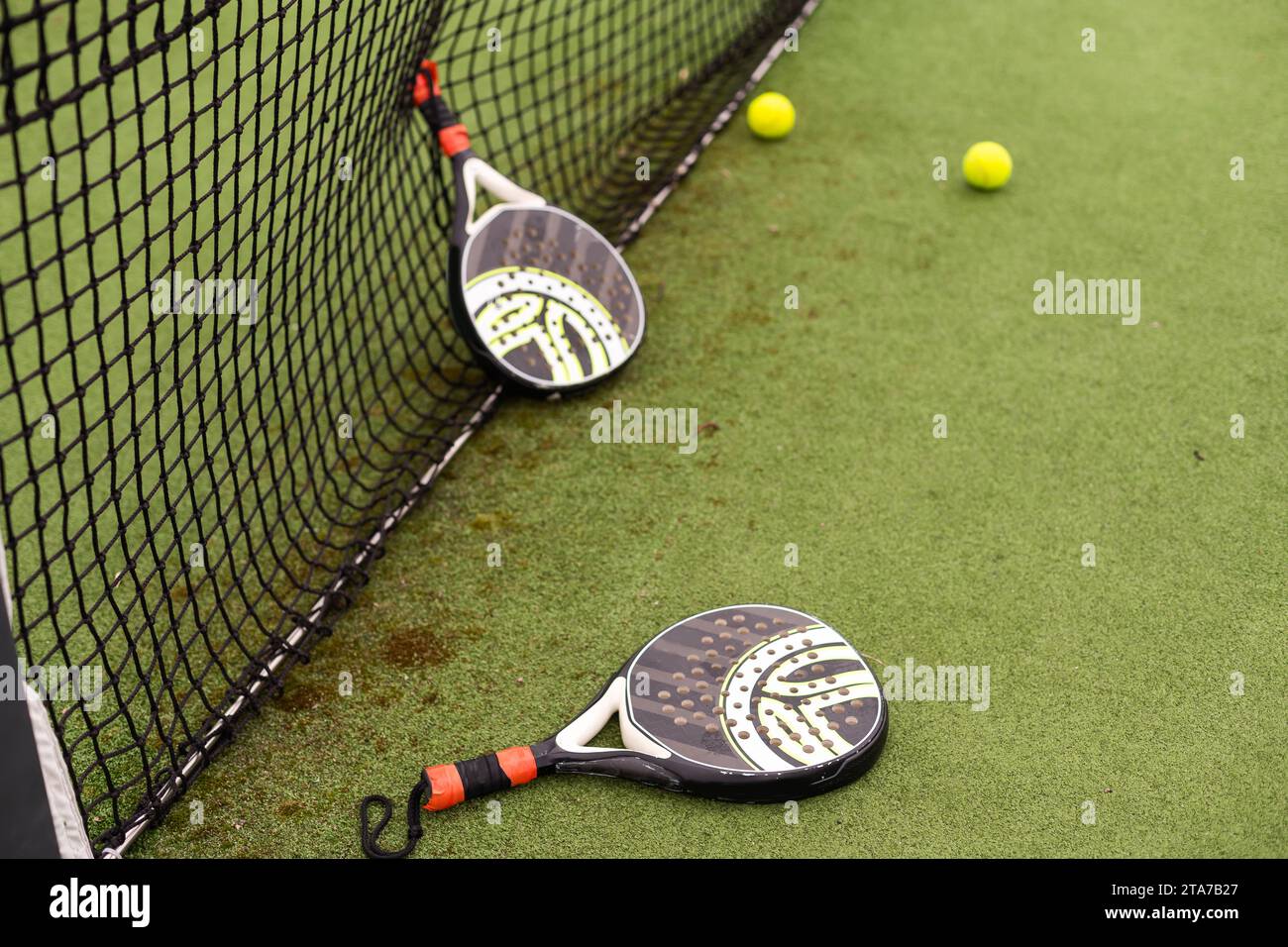 paddle sport on the paddle court, ball, rackets Stock Photo - Alamy