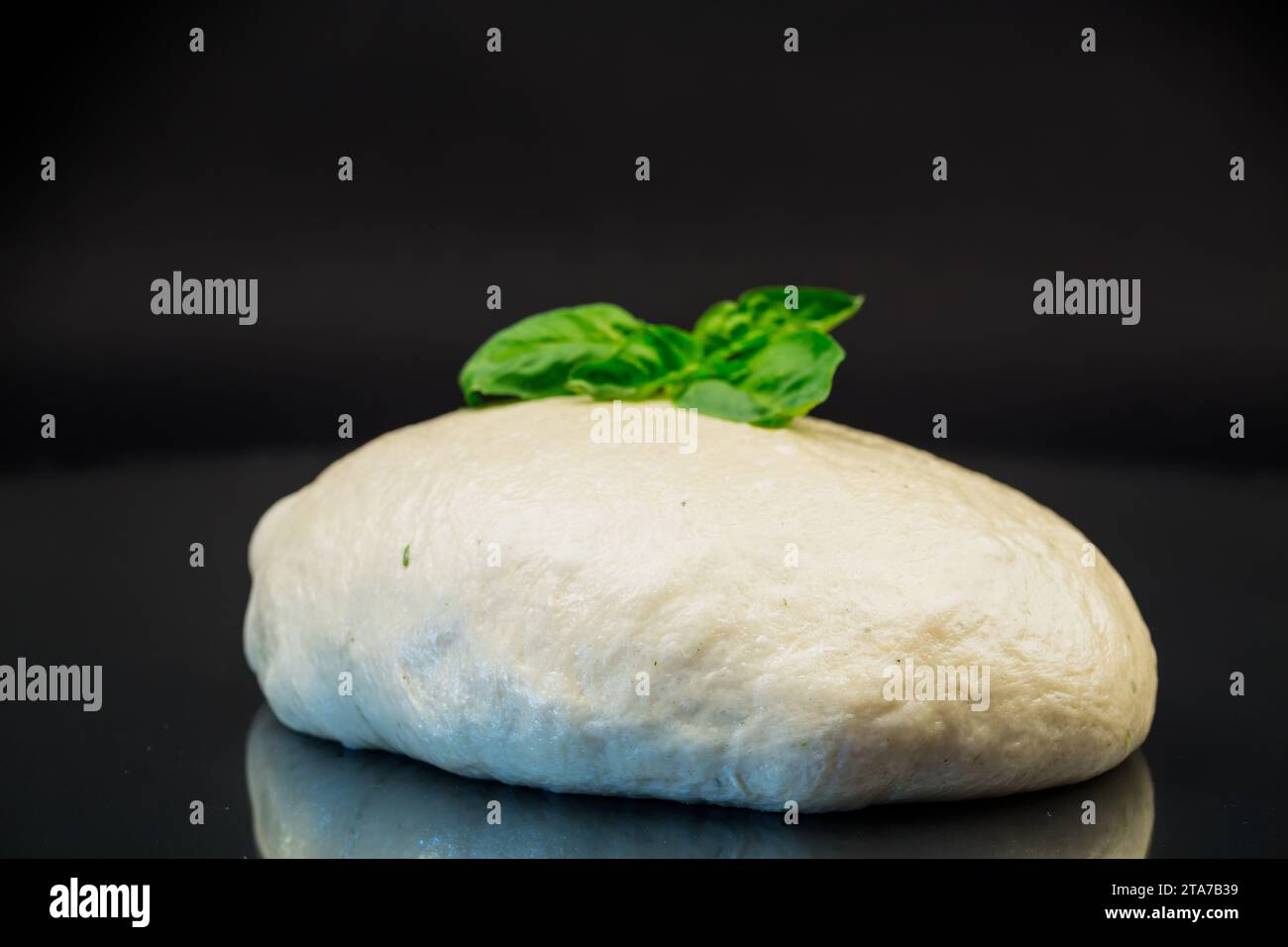 homemade yeast soft dough, isolated on black background Stock Photo - Alamy
