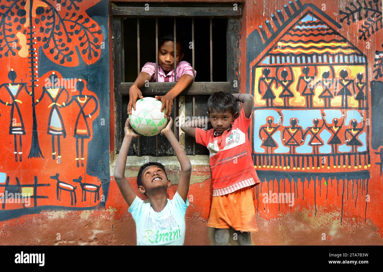 The rural village children are playing in the front of their beautiful ...