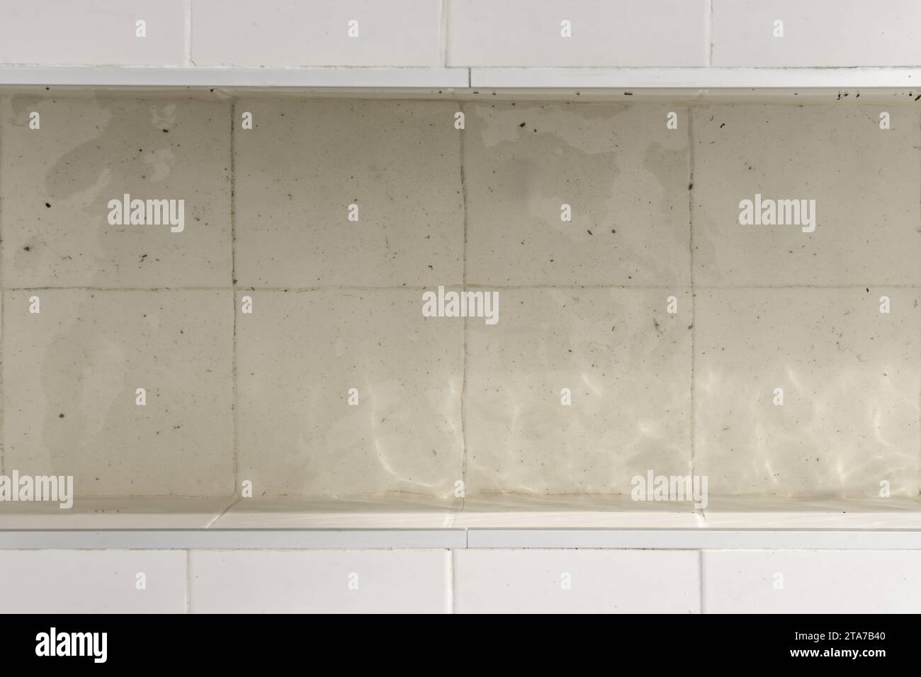 White square tiles hi-res stock photography and images - Alamy