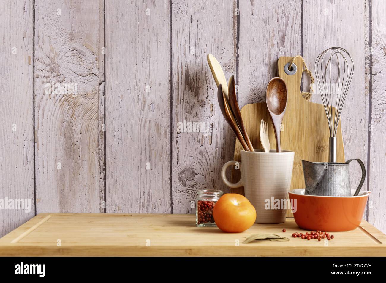 wooden and fiber kitchen utensils on a bamboo board along Stock Photo ...