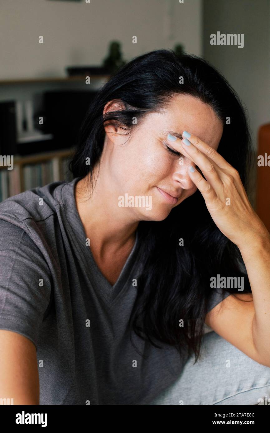 Hands touching forehead hi-res stock photography and images - Alamy