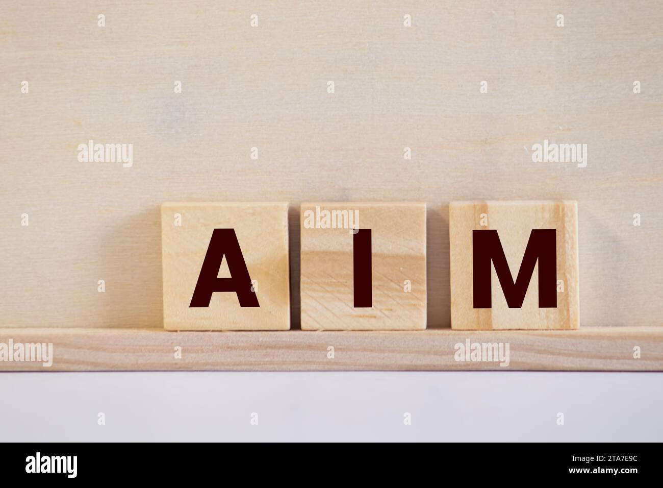 AIM word wooden object isolated white background and copy space - Goal ...