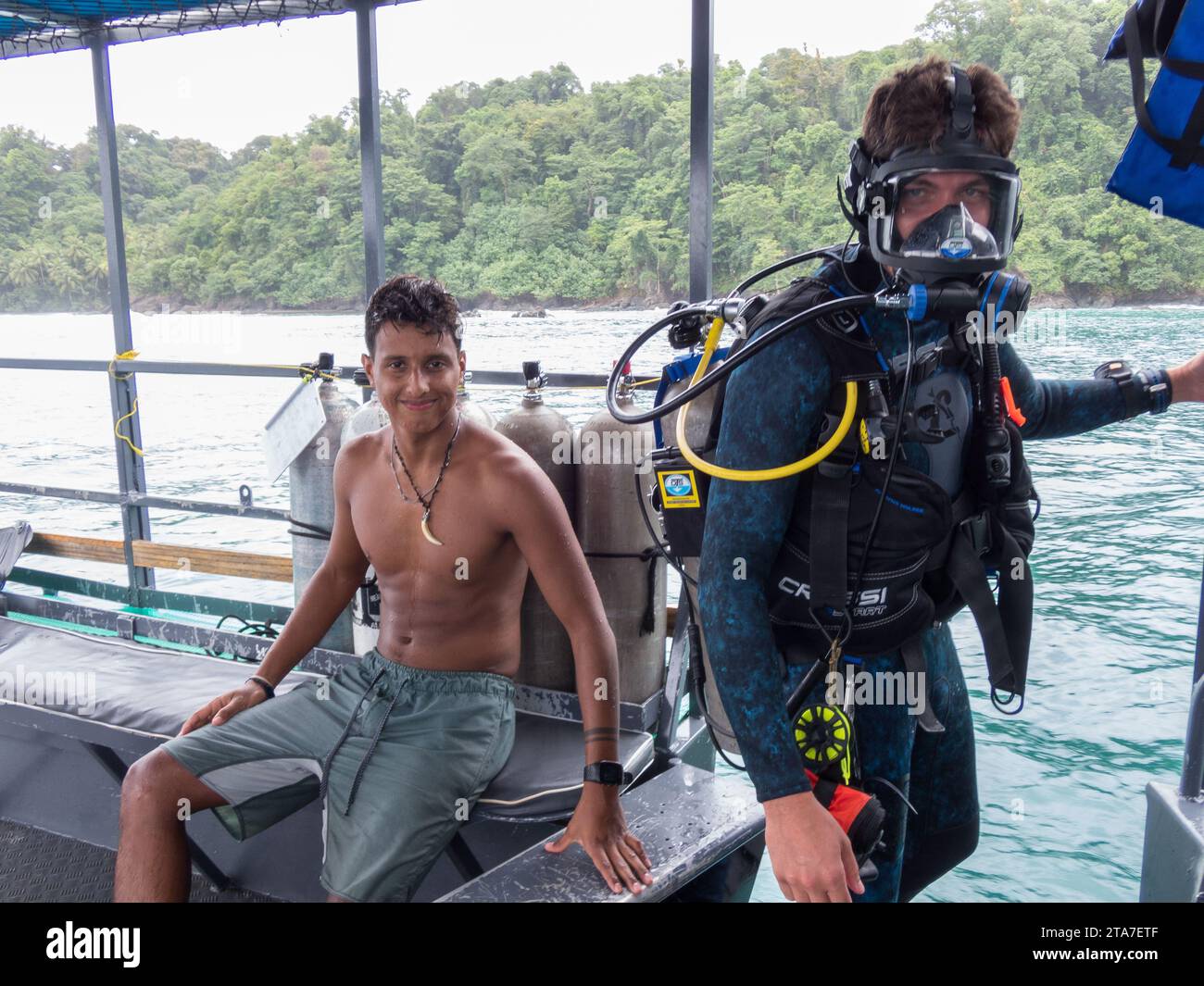 Diver and sailor in a boat sailing in Costa Rican waters Stock Photo ...