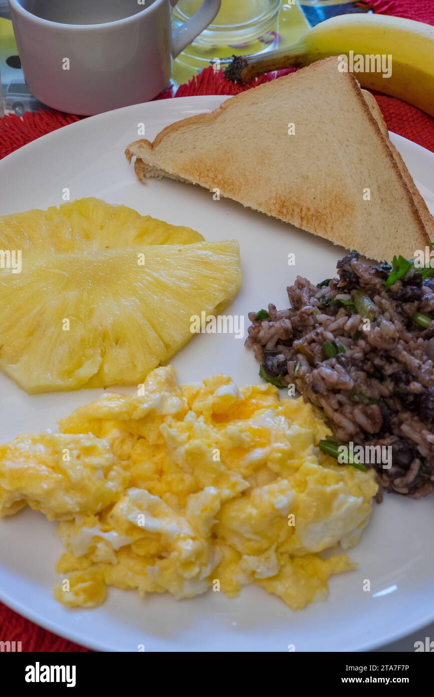 Breakfast with scrambled eggs, corn and black beans in Costa Rica Stock ...