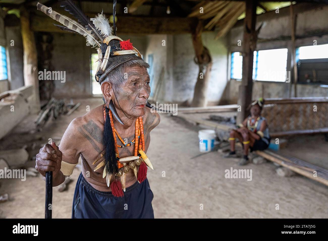Konyak tribe elder, warrior with beautiful tribal ornaments and facial ...