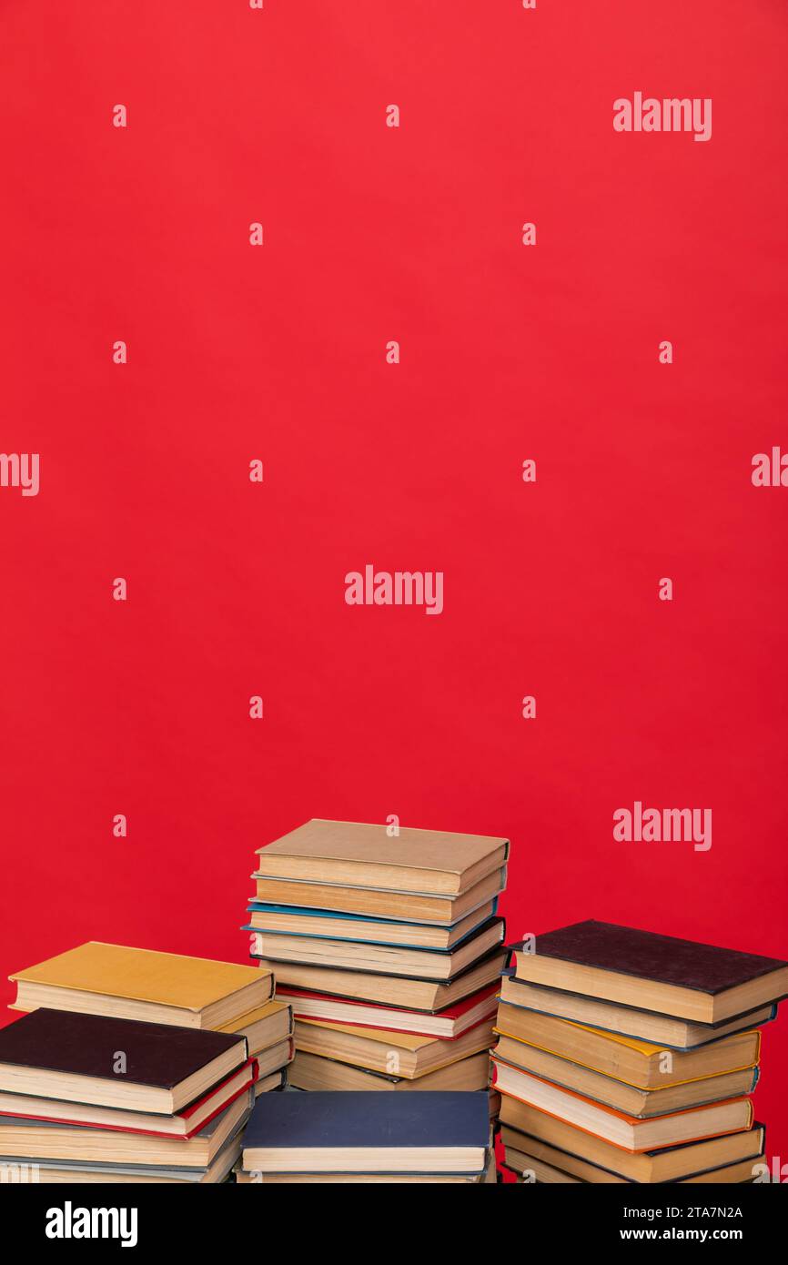 Stack of books background. many books piles Stock Photo - Alamy