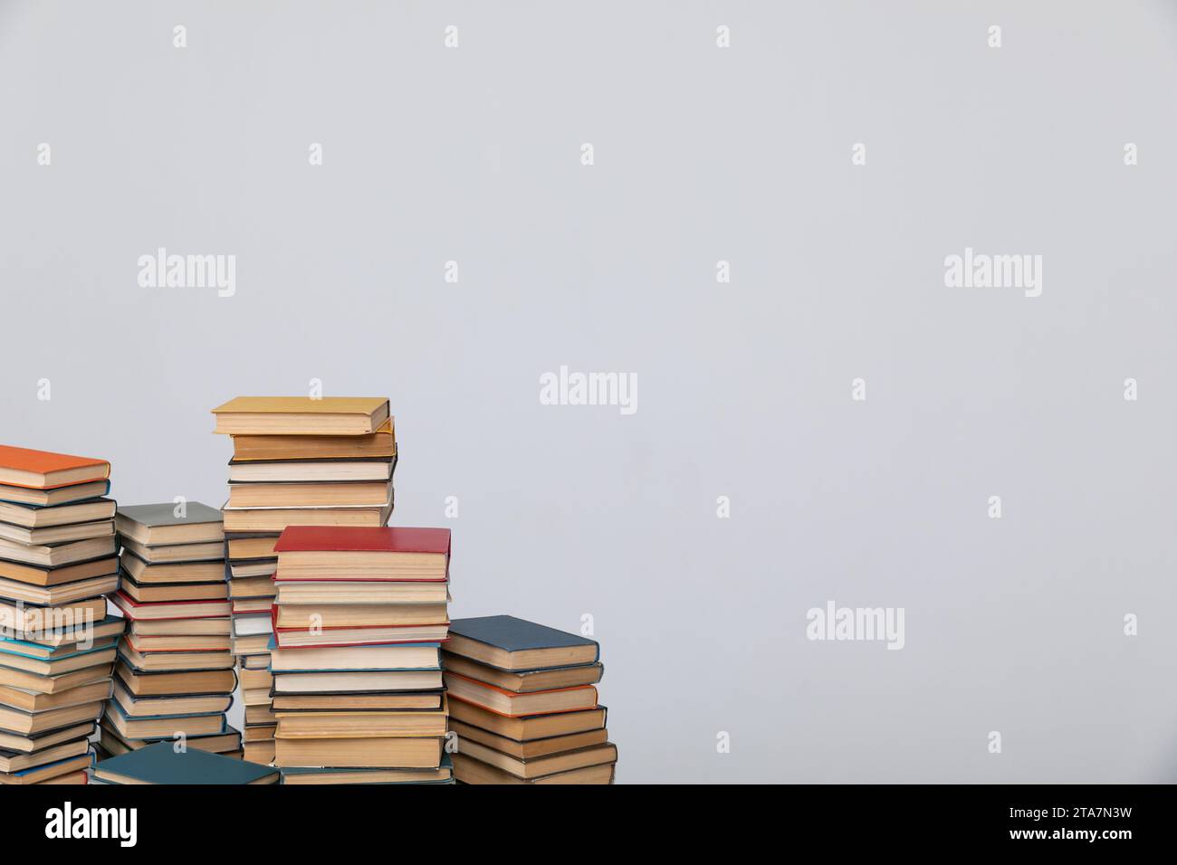 A simple composition of many books, stack or pile of books on wooden ...