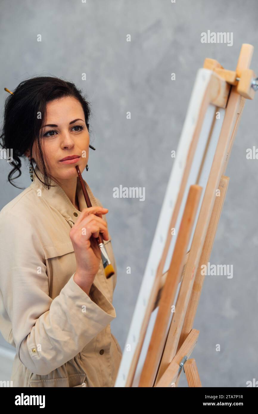 Female Artist Works on Abstract Oil Painting, Moving Paint Brush ...