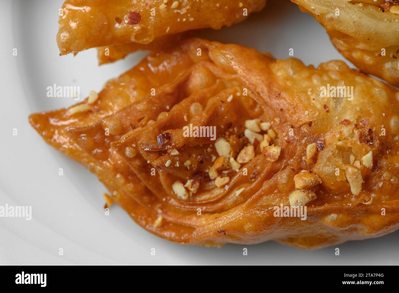 Turkish baklava - dessert made from puff pastry with honey and nuts ...