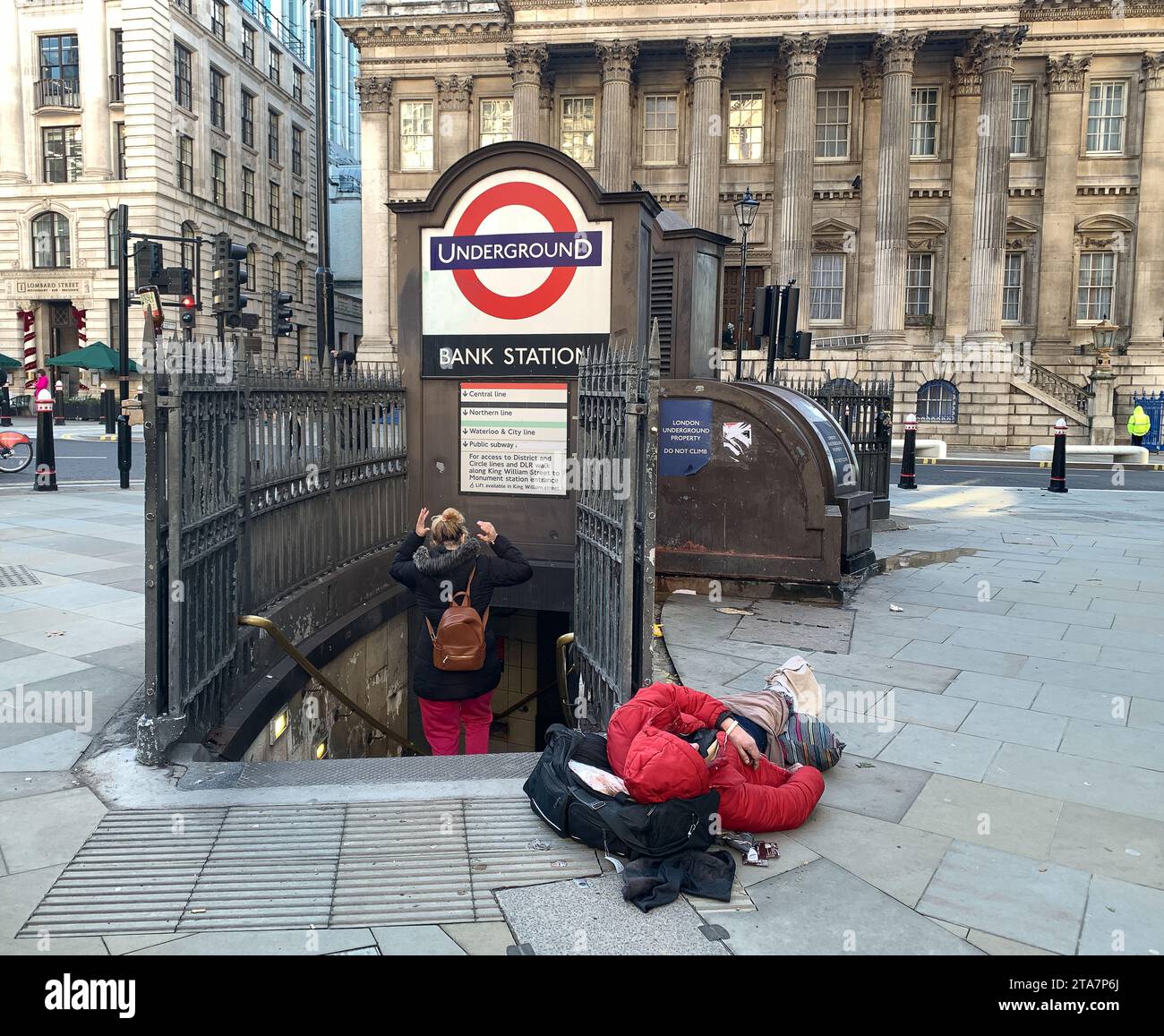 London, UK. 28th November, 2023. A homeless man sadly sleeps on the ...