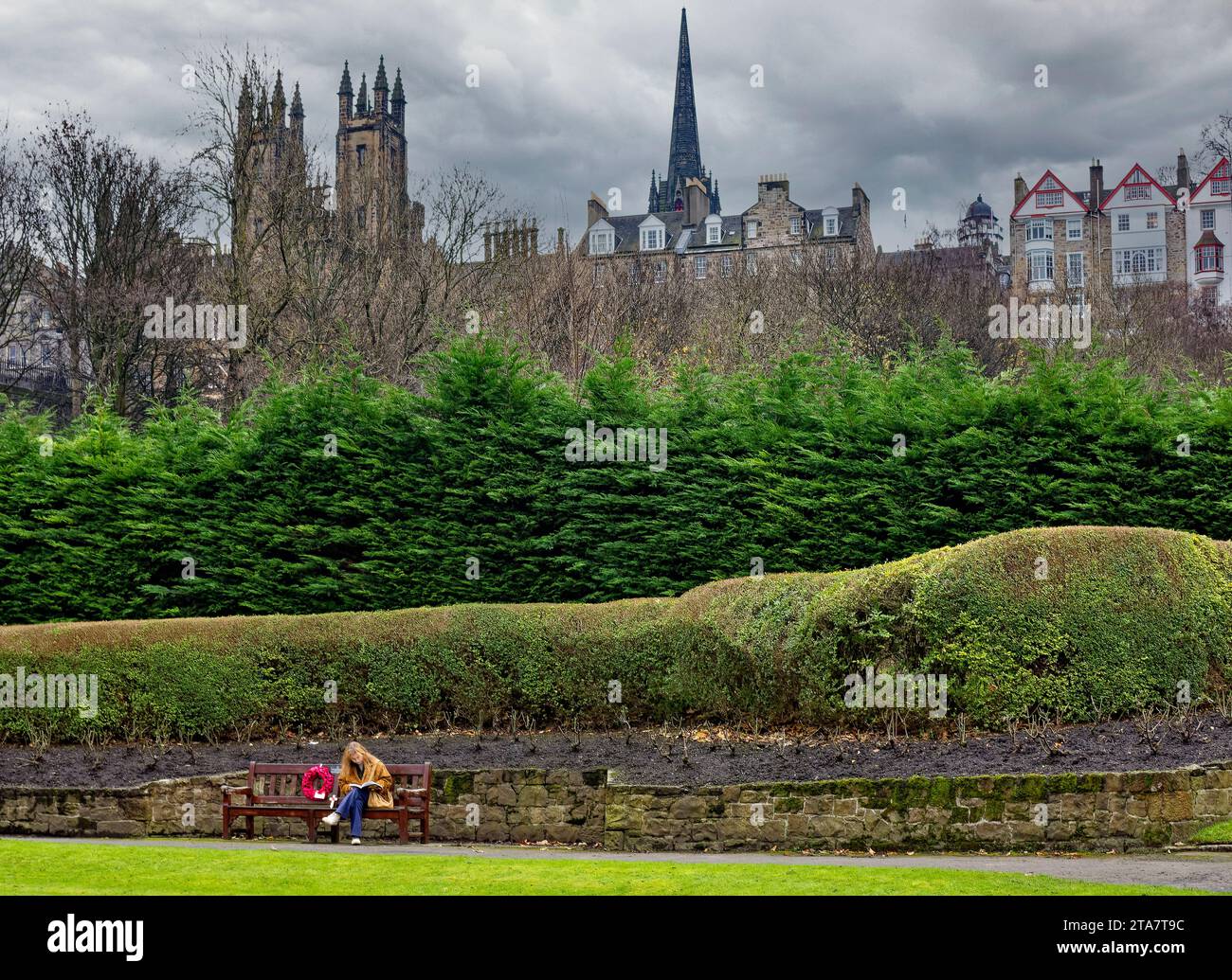 Edinburgh Scotland Princes Street Gardens girl reading in the park on a ...
