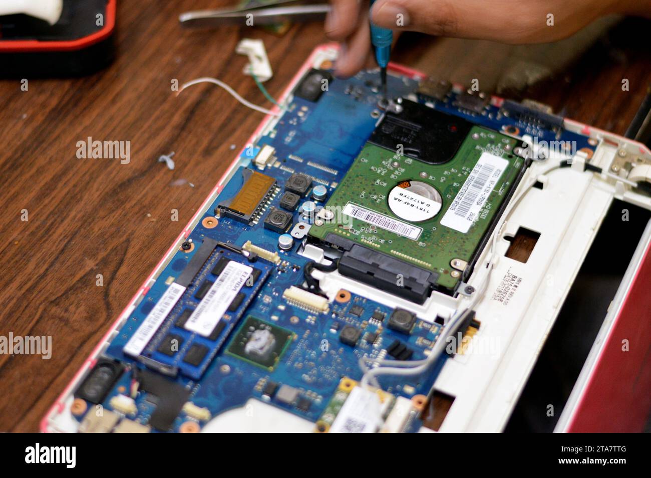 Cairo, Egypt, November 1 2023: maintenance of a laptop, fixing a ...