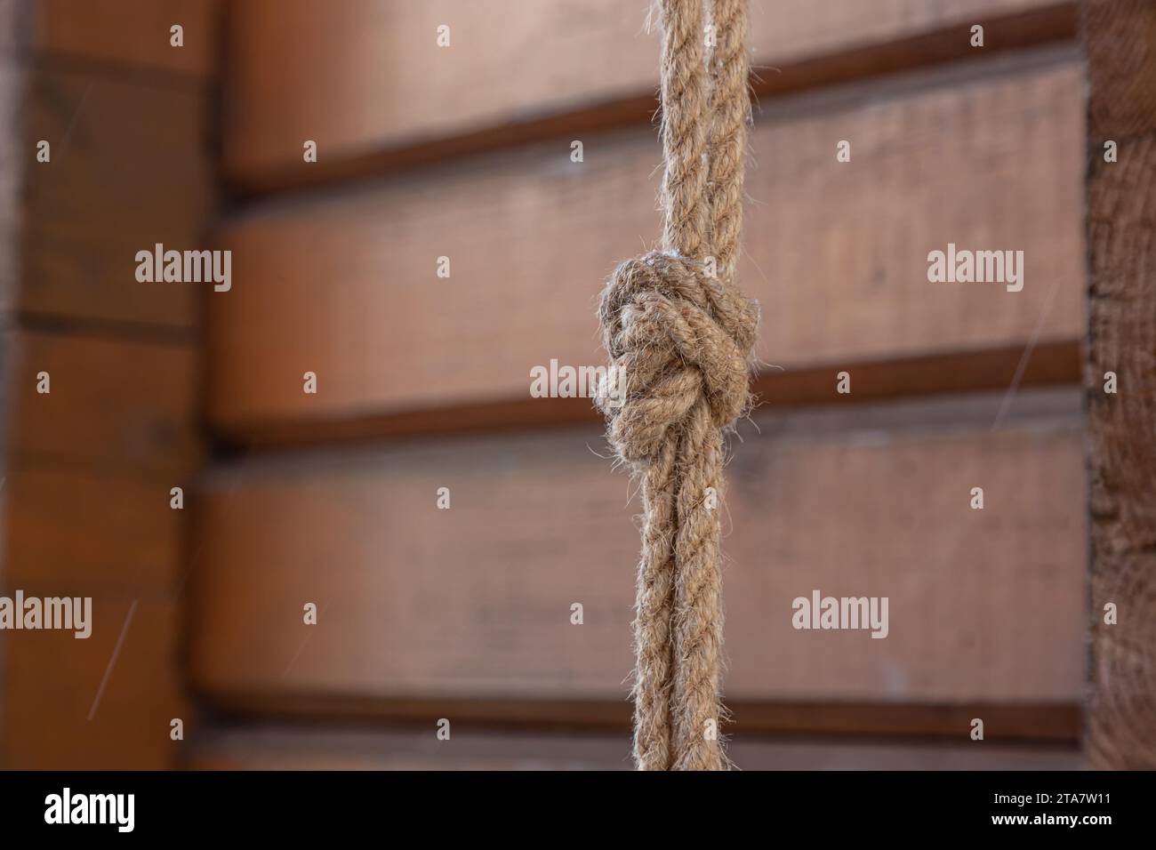 Bow knot made of linen rope string isolated over the background Stock ...