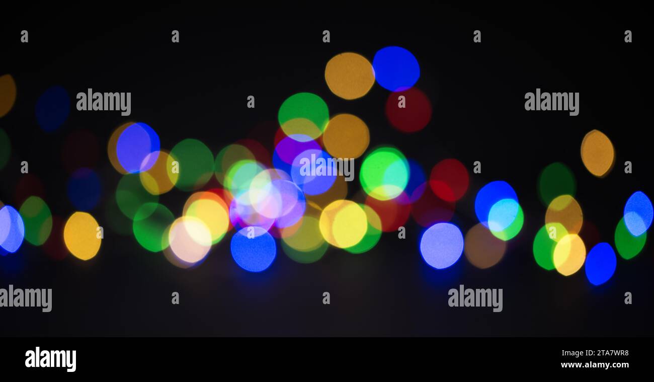 Multi colored defocused bokeh lights overlay. Colourful lens flare ...