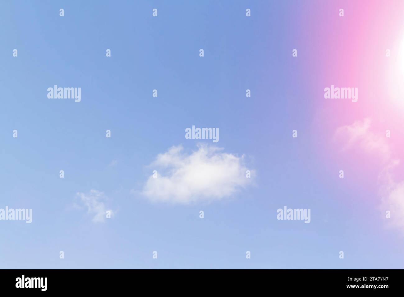 White airy beautiful clouds in a bright blue sky. Clear sunny weather ...