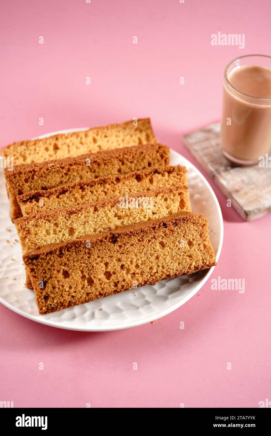 Homemade Indian cake rusk | Dry biscuits isolated on pink background ...