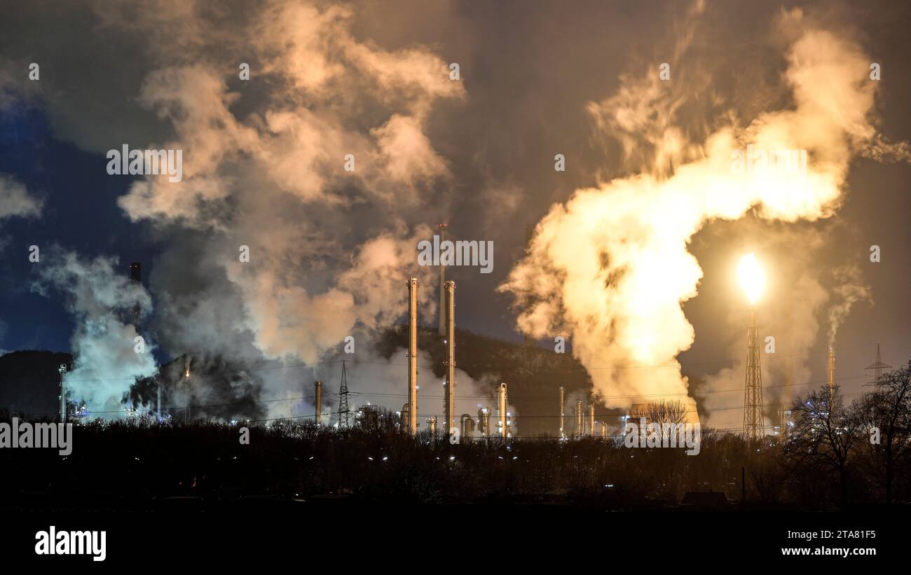 Routine flaring illuminates the night at a BP refinery in Gelsenkirchen ...