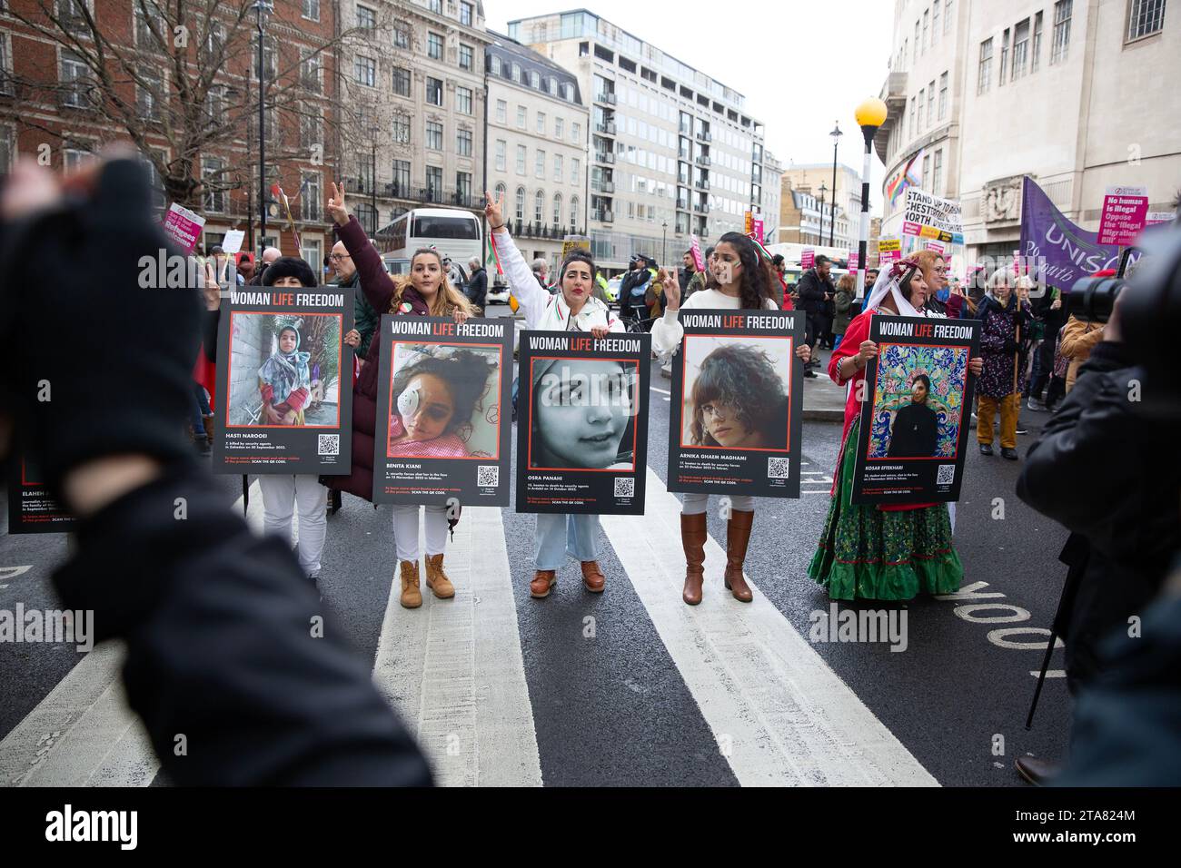 People gather during a demonstration against racism outside the BBC ...