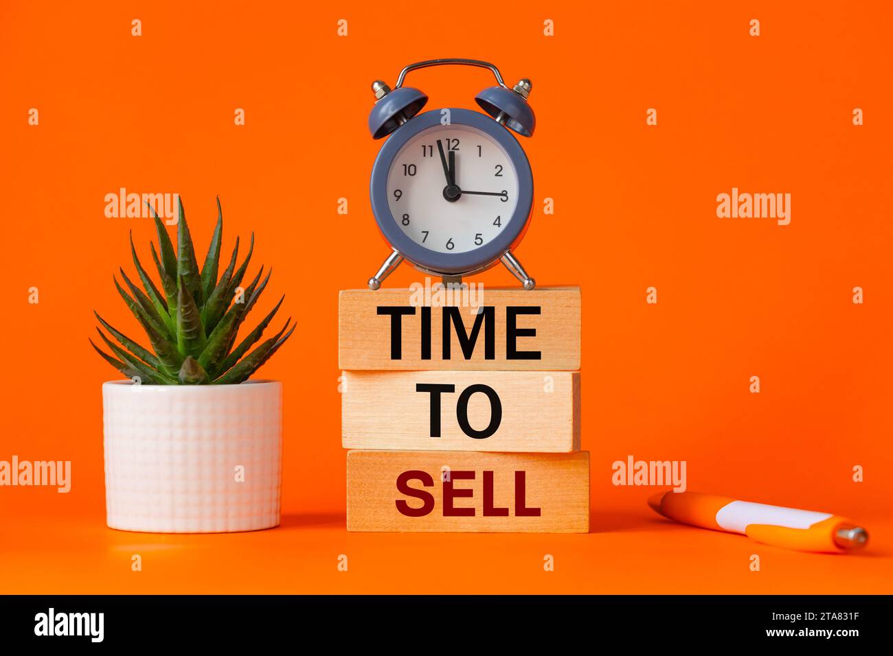 Time to sell symbol. alarm clock and time to sell, word concept on ...