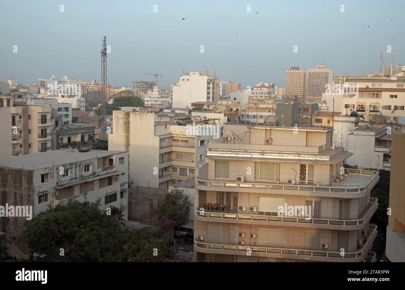 Rooftops at Dusk, Dakar, Senegal. Atlantic Ocean in the distance ...