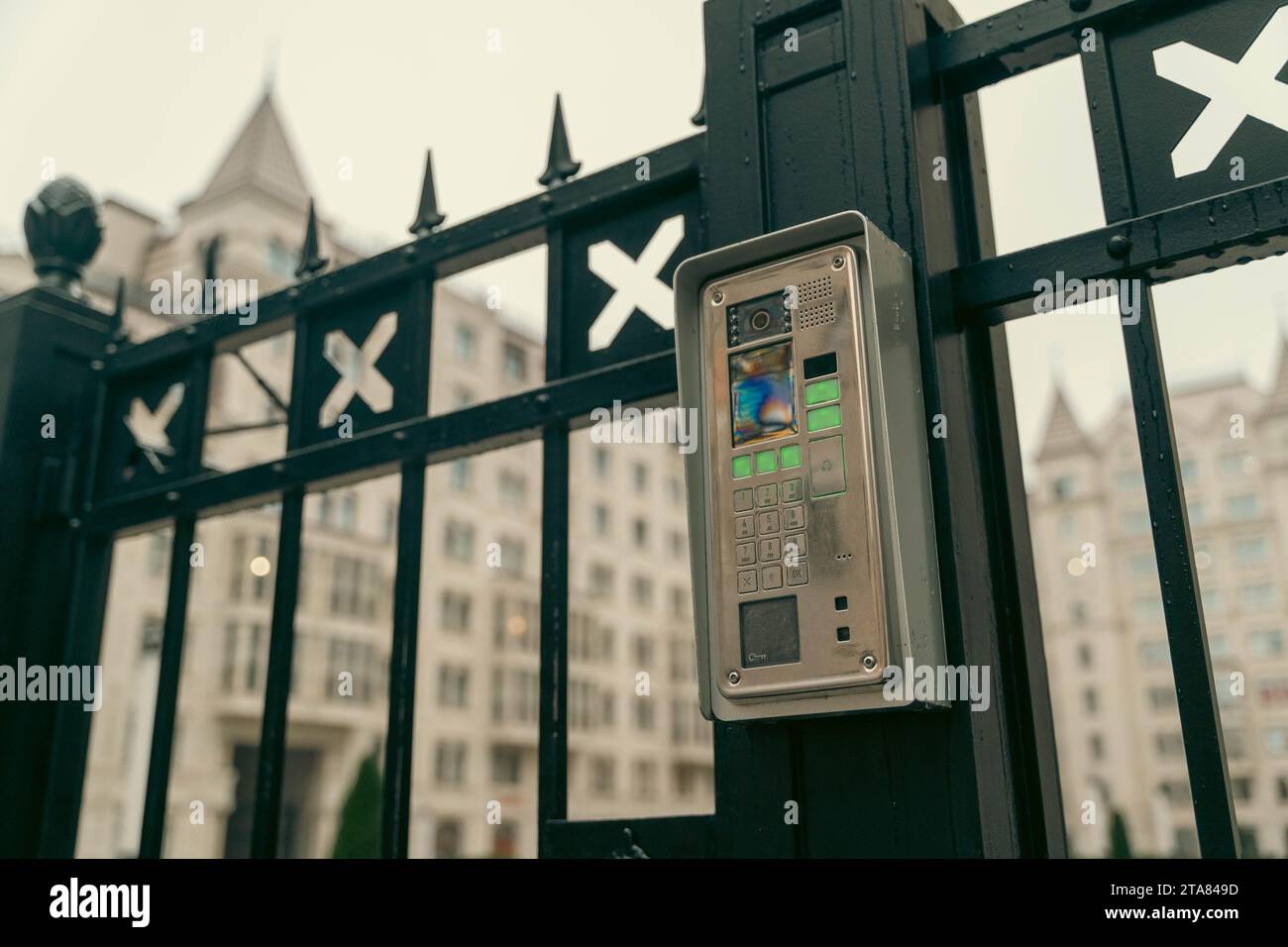 A modern video intercom system installed at the gates of a contemporary ...