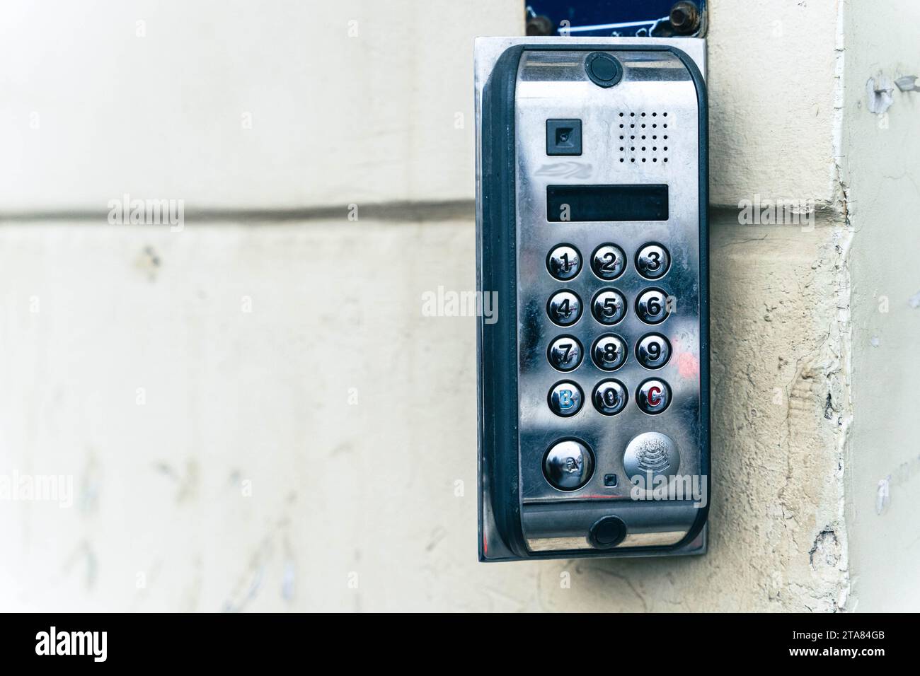 A Close Up Of A Modern Intercom System With A Built In Camera And