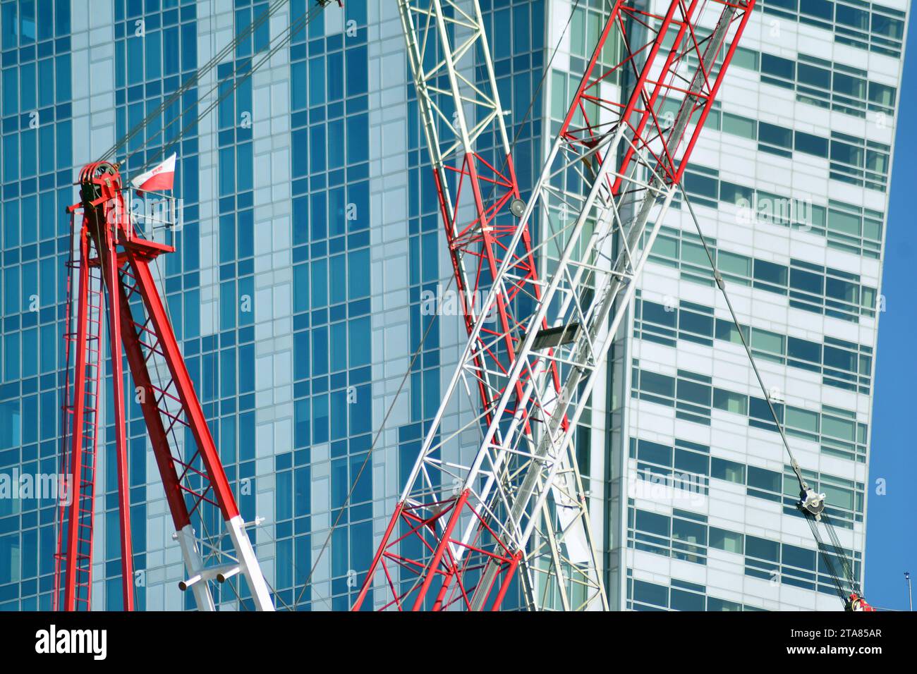 High rise building under construction. Installation of glass facade ...