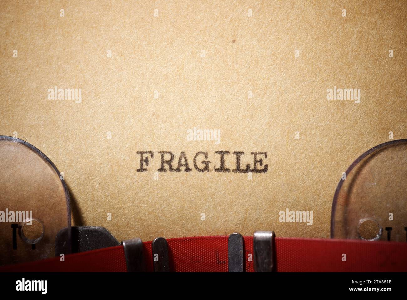 Fragile word written with a typewriter Stock Photo - Alamy
