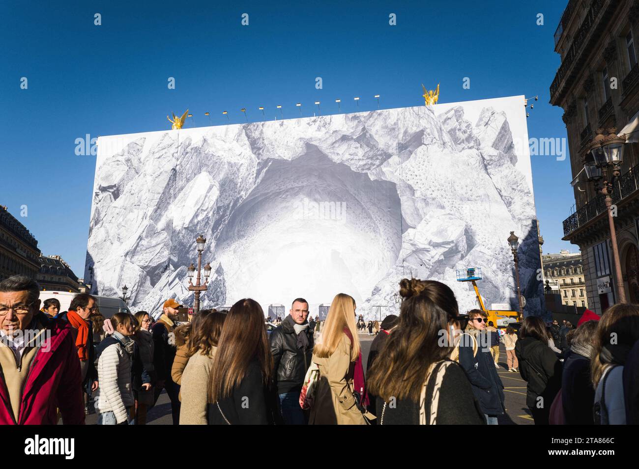 Paris, France. 29th Nov, 2023. Passers-by walk past the restoration of ...