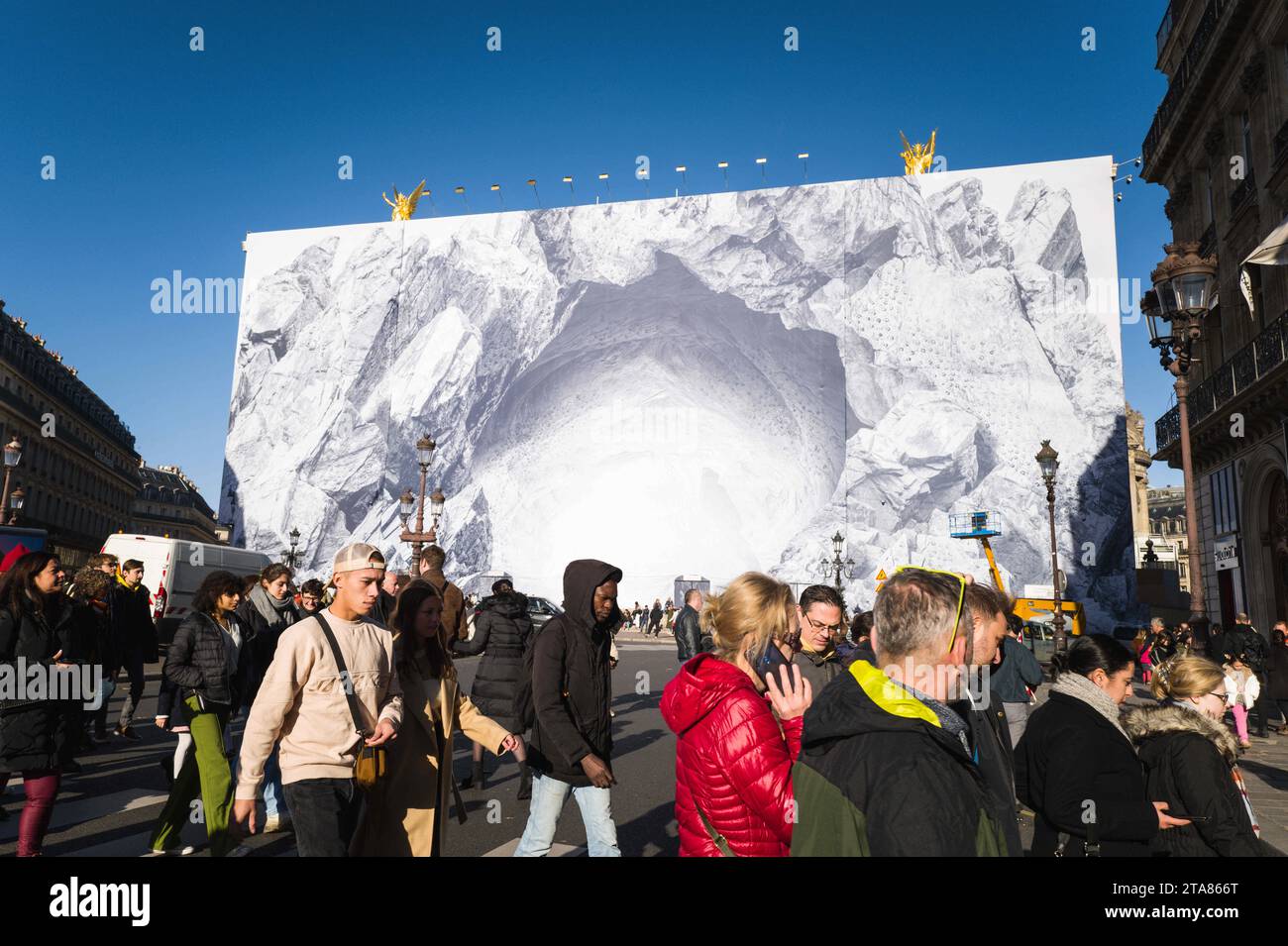 Paris, France. 29th Nov, 2023. Passers-by walk past the restoration of ...
