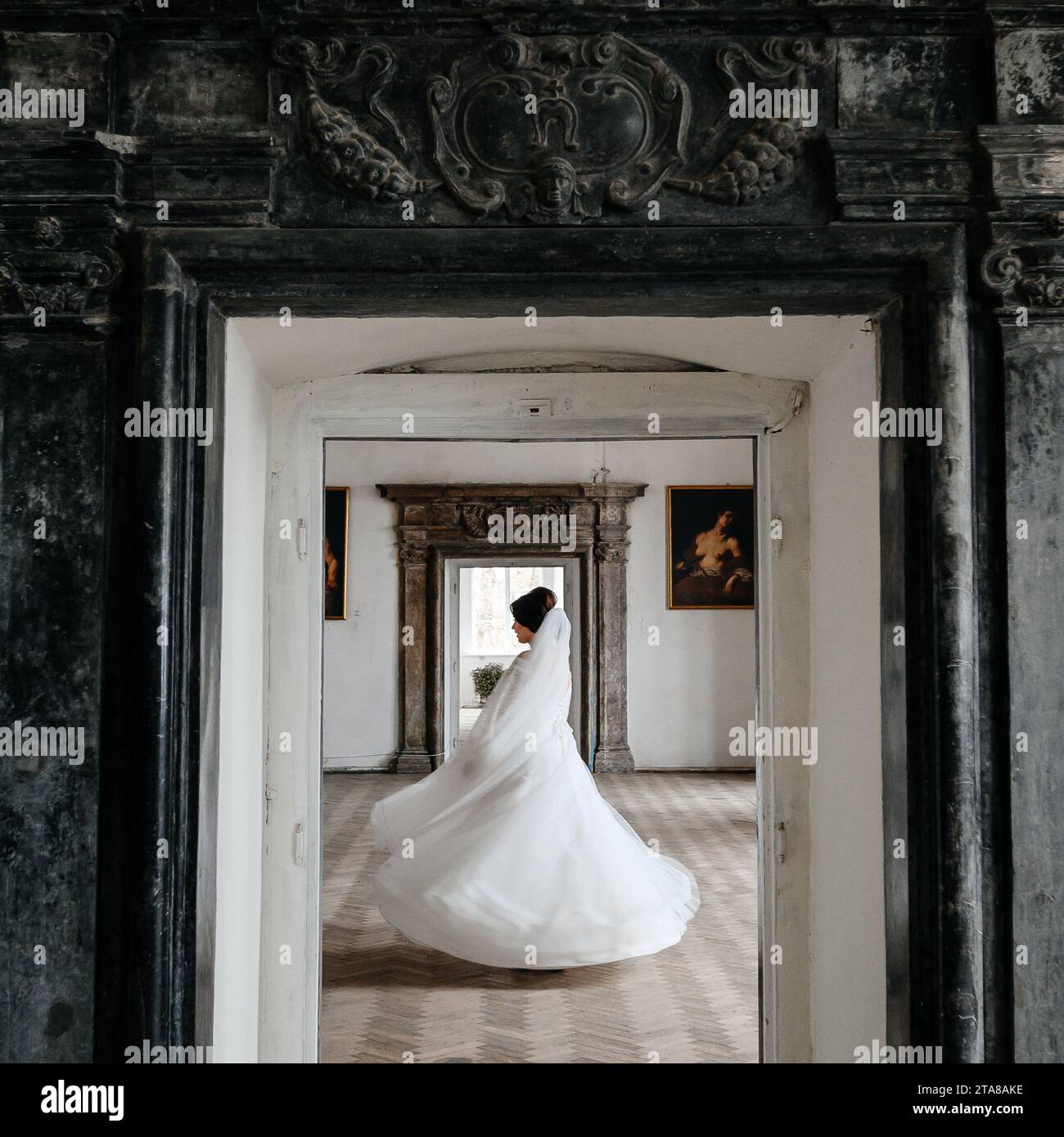 Lviv, Ukraine March 4, 2023:The bride is circling in an ancient castle ...