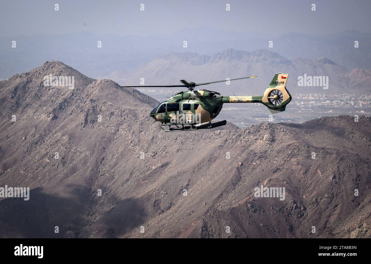 Nizwa, Oman. 28th Nov, 2023. An Omani army helicopter transports parts ...