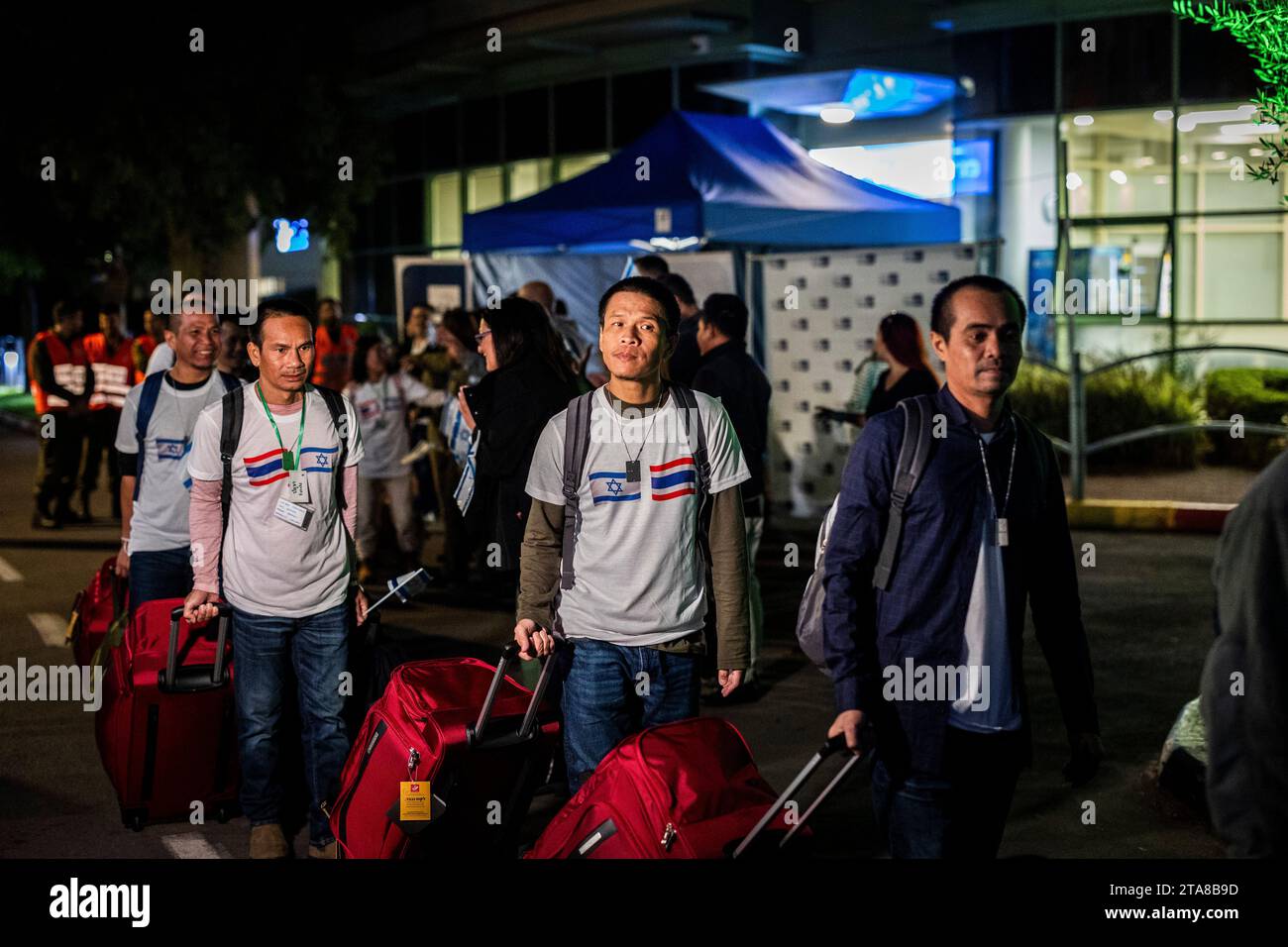 Ramle, Israel. 29th Nov, 2023. Thai migrant workers, who were released ...
