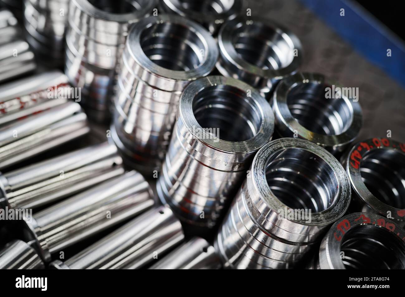 Steel rings and cylinders made with automated machines Stock Photo - Alamy