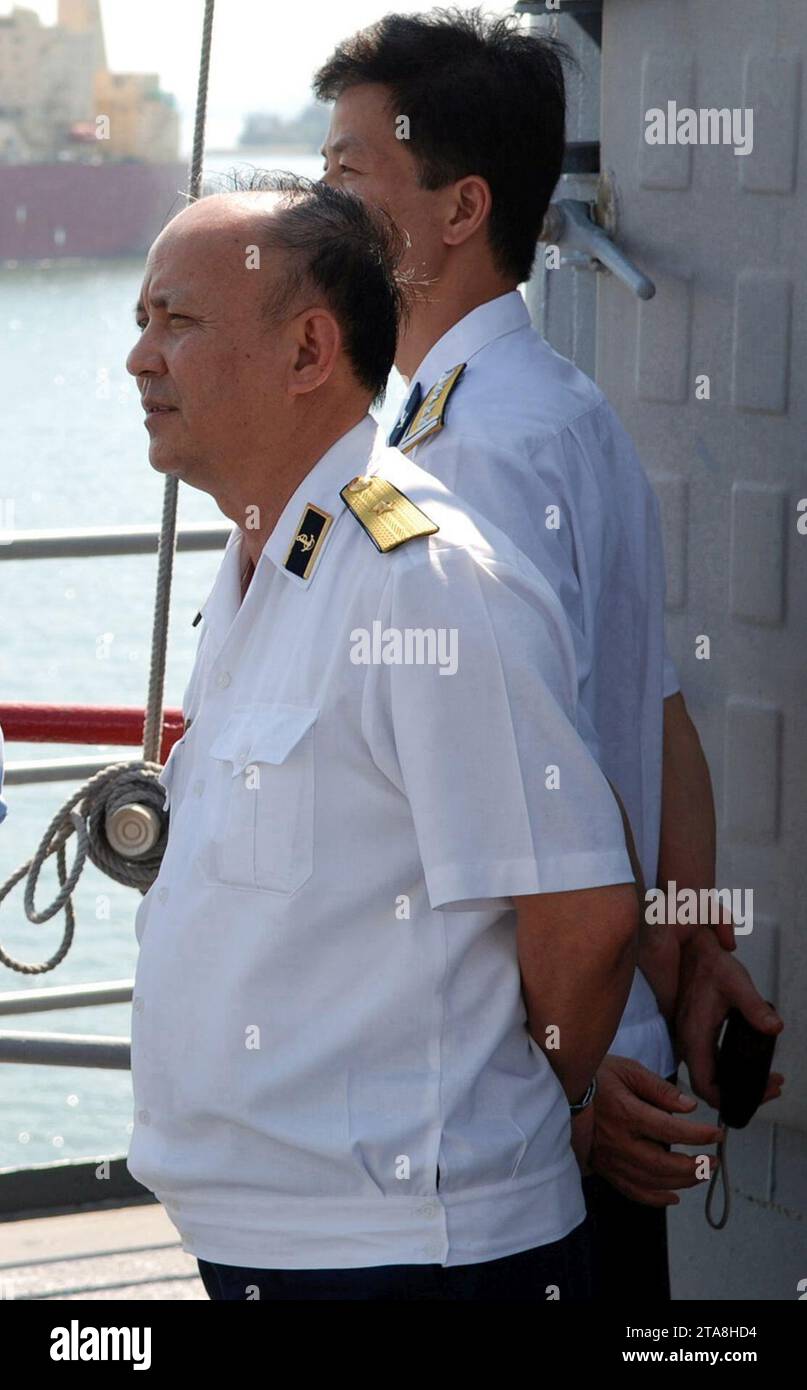 Vietnamese People's Navy Rear Adm. Do Viet Cuong, center, and Capt. Nguyen Trong Binh Stock ...