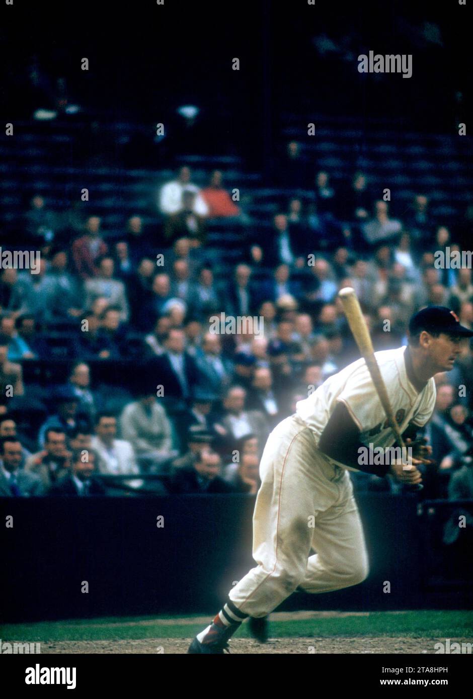 BOSTON, MA - MAY, 1957: Ted Williams #9 of the Boston Red Sox swings at ...