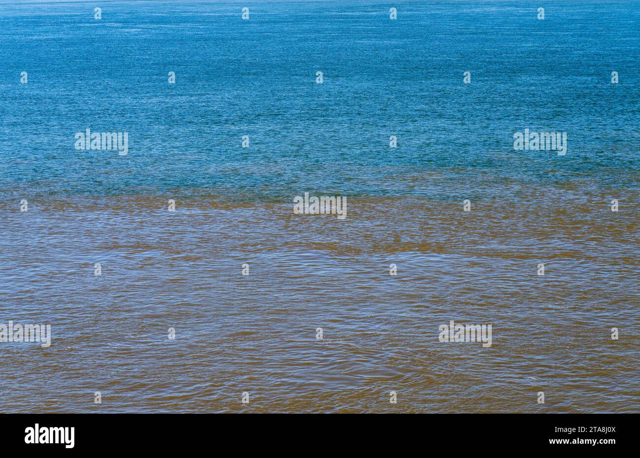 Confluence of the blue Ohio river and brown Mississippi river at Cairo ...