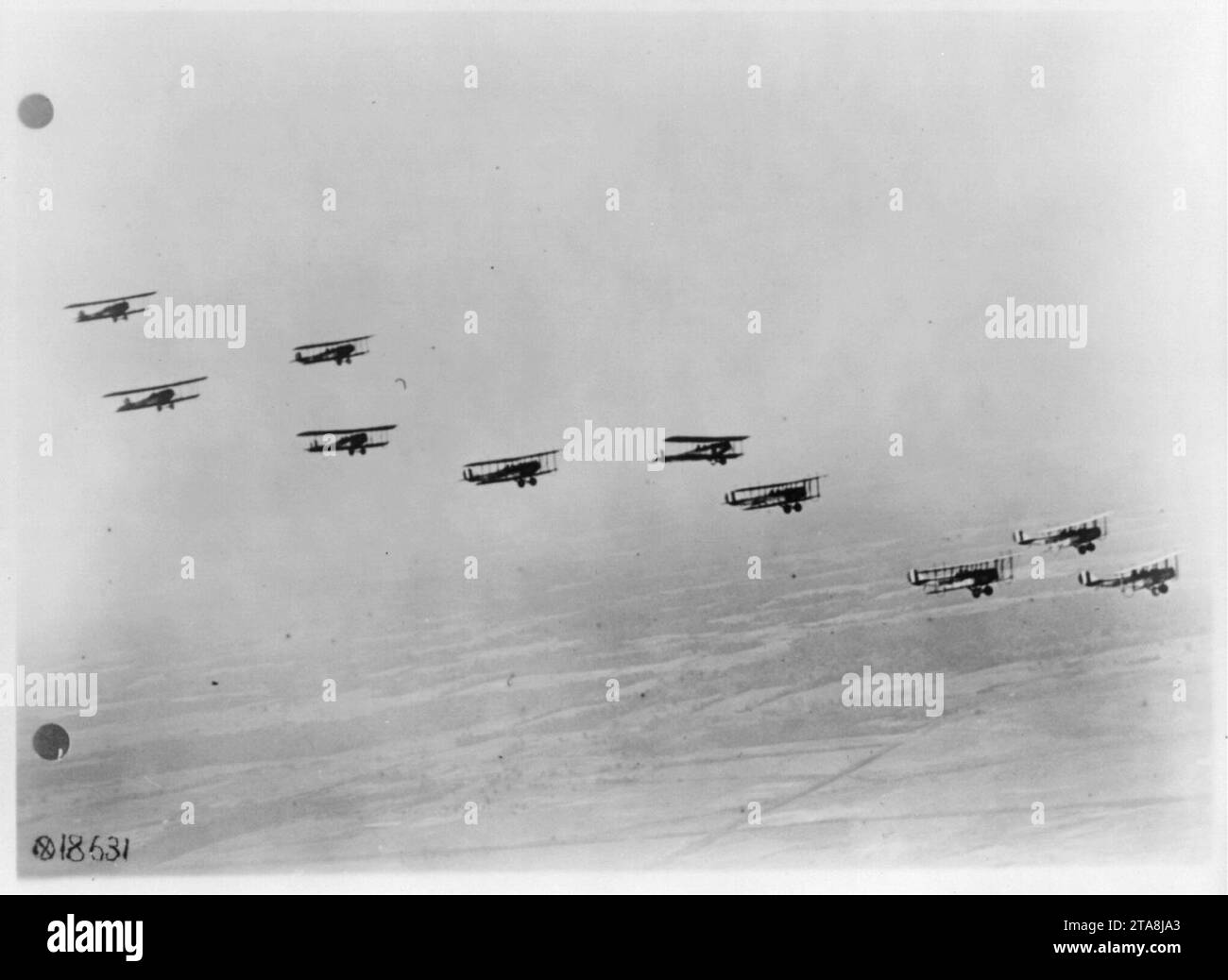 View from airplane of biplanes flying in formation- Side view of ...